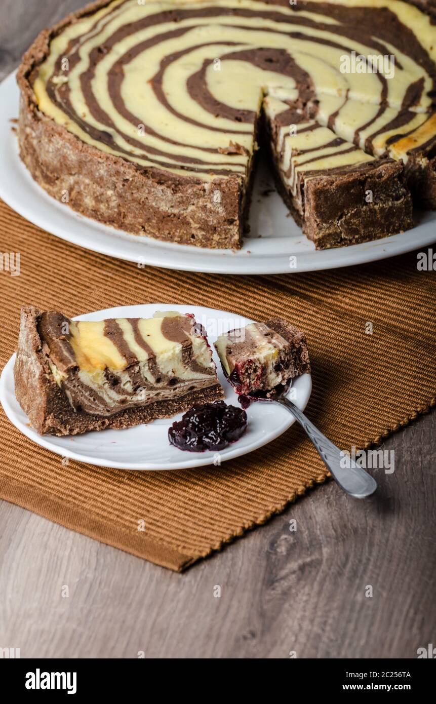Two-tone cheesecake with homemade cherry jam, homamade Stock Photo - Alamy