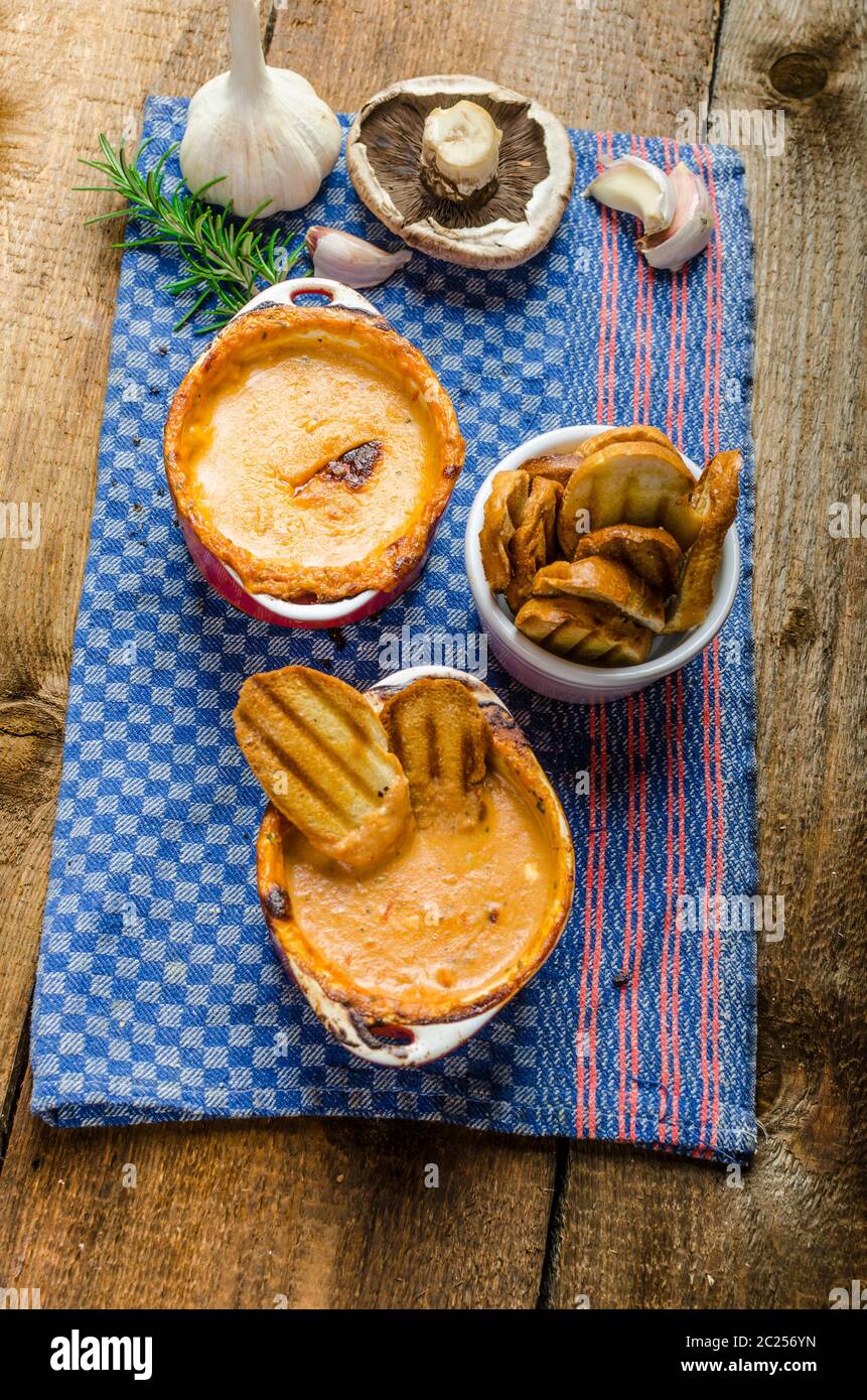 Tomato and cheese dip baked with crispy garlic panini toast with herbs ...