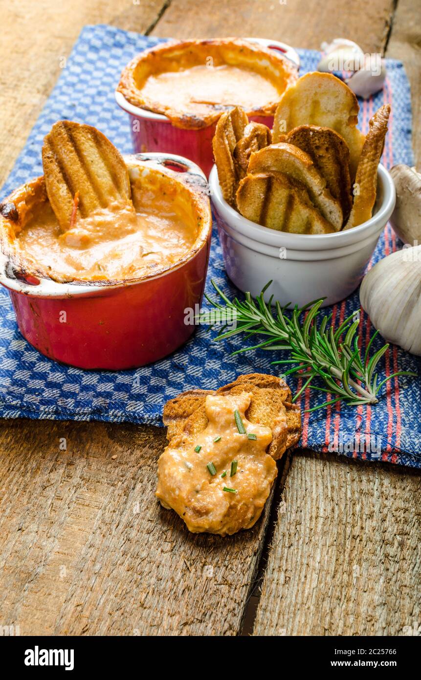 Tomato and cheese dip baked with crispy garlic panini toast with herbs ...