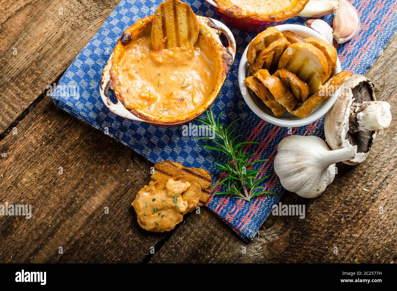 Tomato and cheese dip baked with crispy garlic panini toast with herbs ...