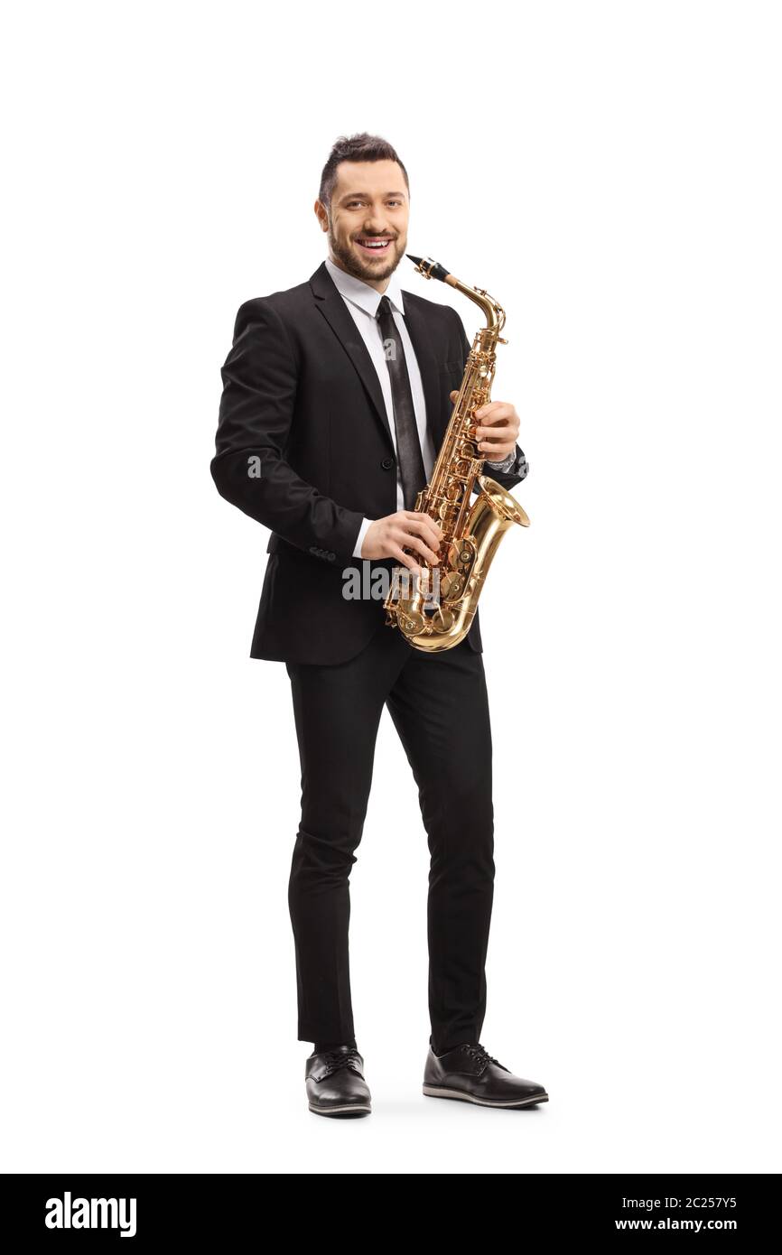 Full length portrait of a man in a suit standing and holding a ...