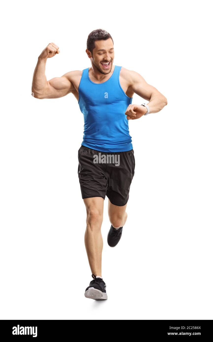 Full length portrait of a male athlete running towards the camera and ...