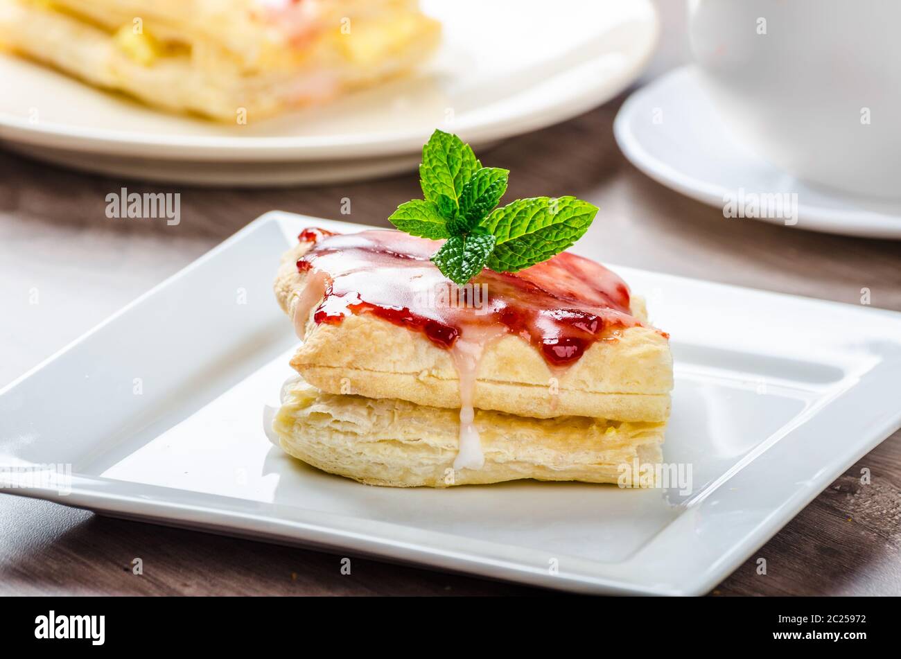 Cake from flaky pastry with jam and cranberries, all homemade Stock ...