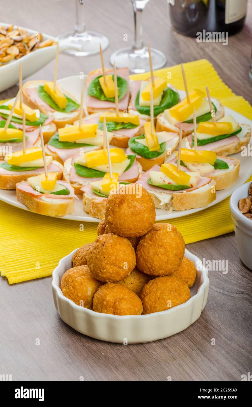 New Year's Eve meal - canapes with ham, cheese and spinach leaves ...
