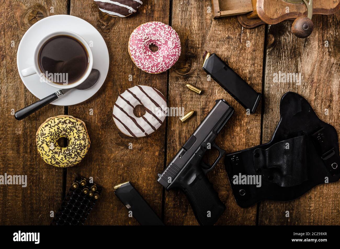 American police officer morning, donuts, juice, fresh black coffee and ...