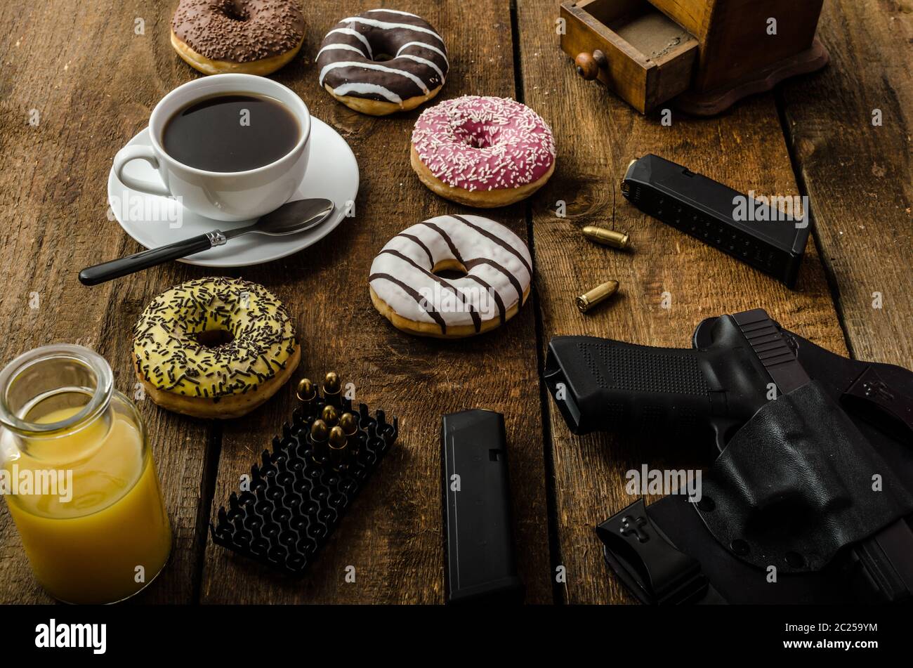 American police officer morning, donuts, juice, fresh black coffee and ...