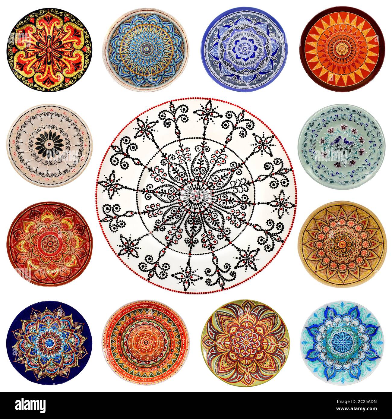 Set of decorative ceramic dishes hand-painted with acrylic paints ...