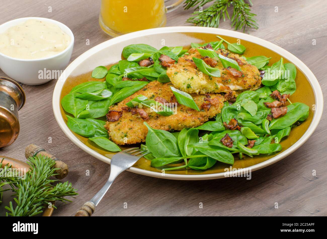 Rabbit steaks with herbs and sour cream, mustard mayonnaise, sprinkled ...