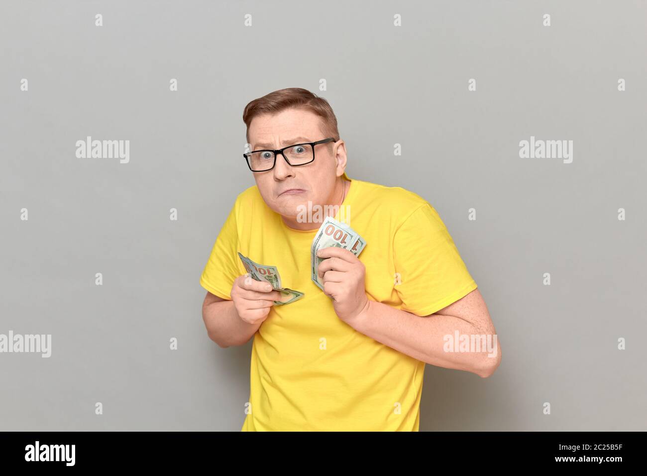 Stingy Person High Resolution Stock Photography and Images - Alamy