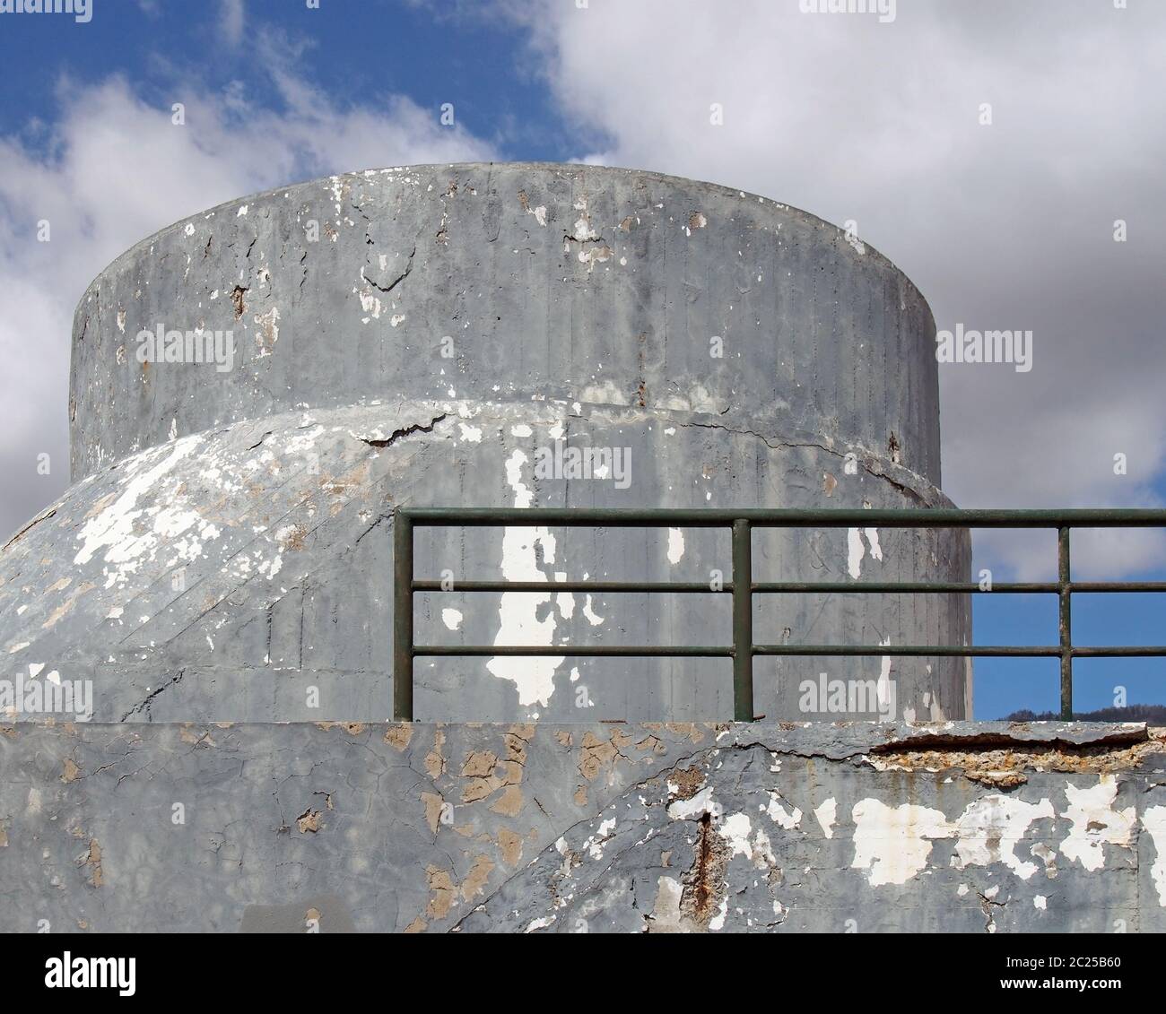 an old crumbling concrete military bunker type structure with rounded ...