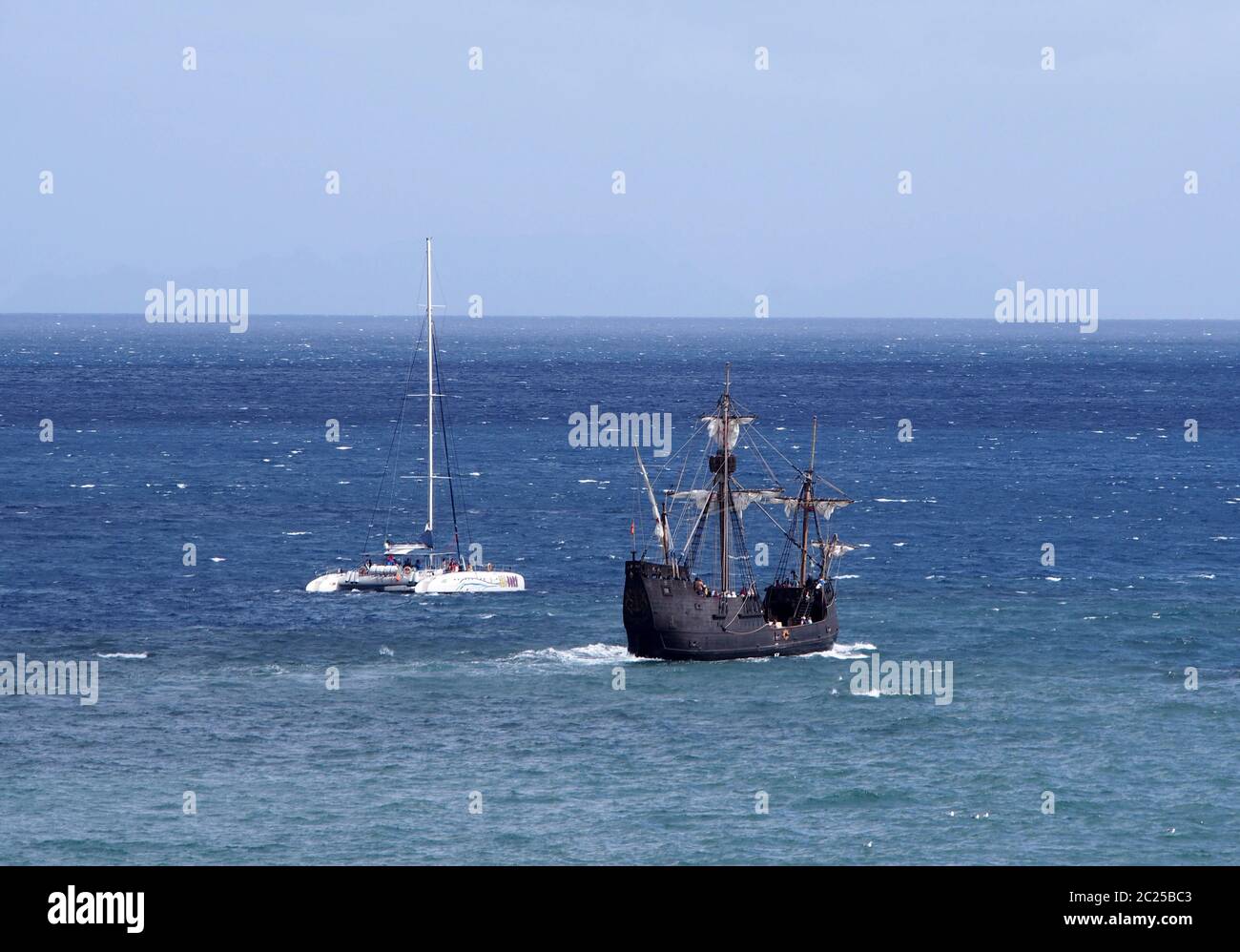 tthe replica santa maria sailing ship leaving funchal in madeira with a ...