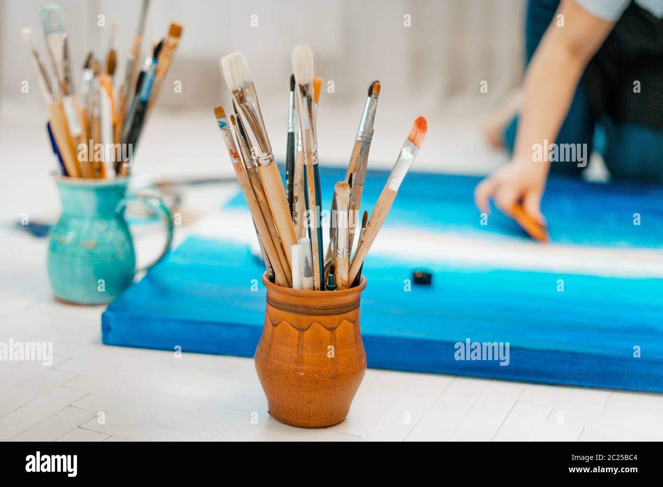 Tools and equipment for the artist. Palette and brushes close-up. The ...