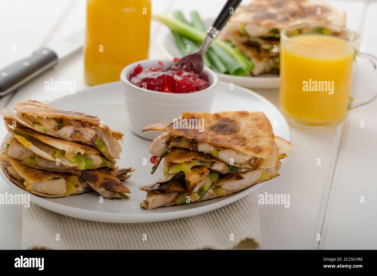 Turkey quesadillas with currant sauce, fresh orange juice Stock Photo ...