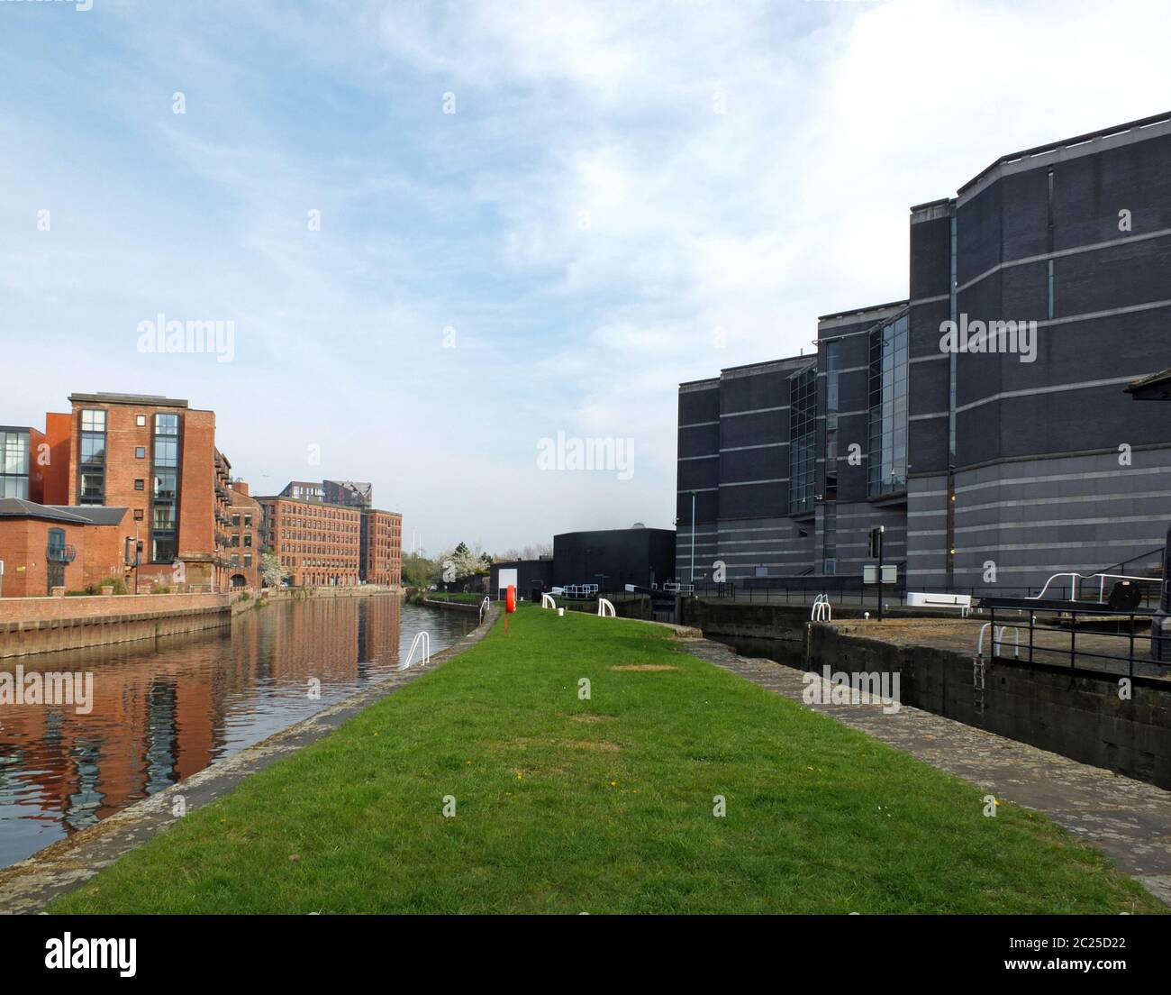 the leeds lock entrance to clarence dock with footbridge over the river ...