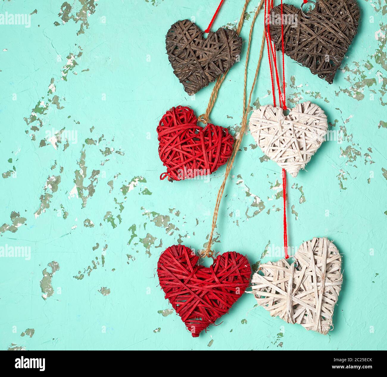 wicker hearts on a green background, empty space Stock Photo - Alamy