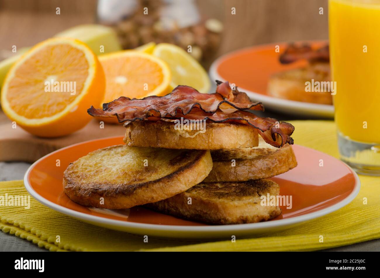 French toast with bacon and fresh juice from oranges Stock Photo - Alamy