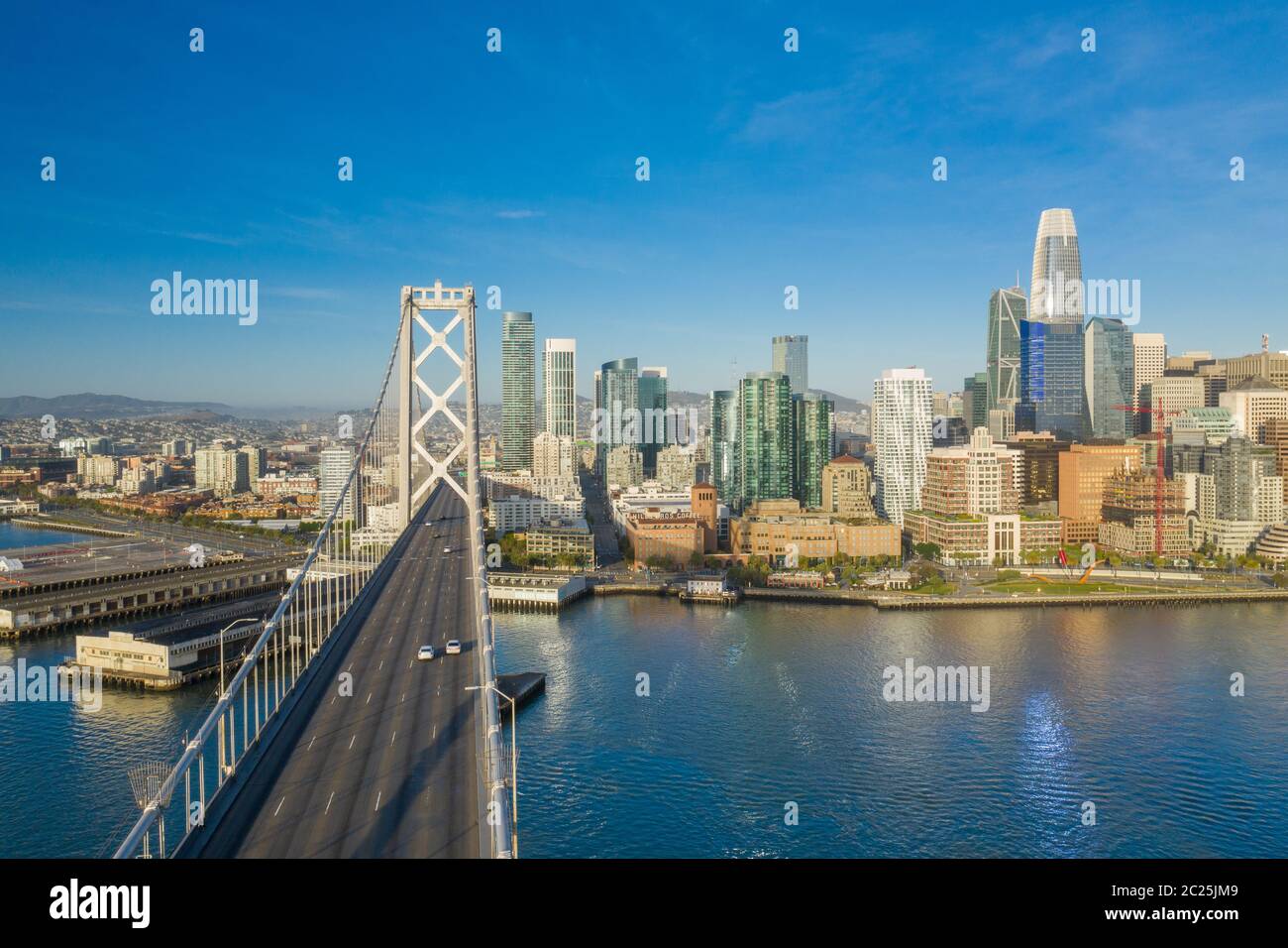 Aerial view of the San Francisco, California, skyline at sunrise. Ample ...