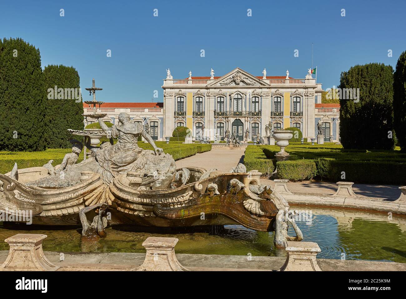 Facade, fountain and gardens of Queluz Palace in Sintra, Portugal ...