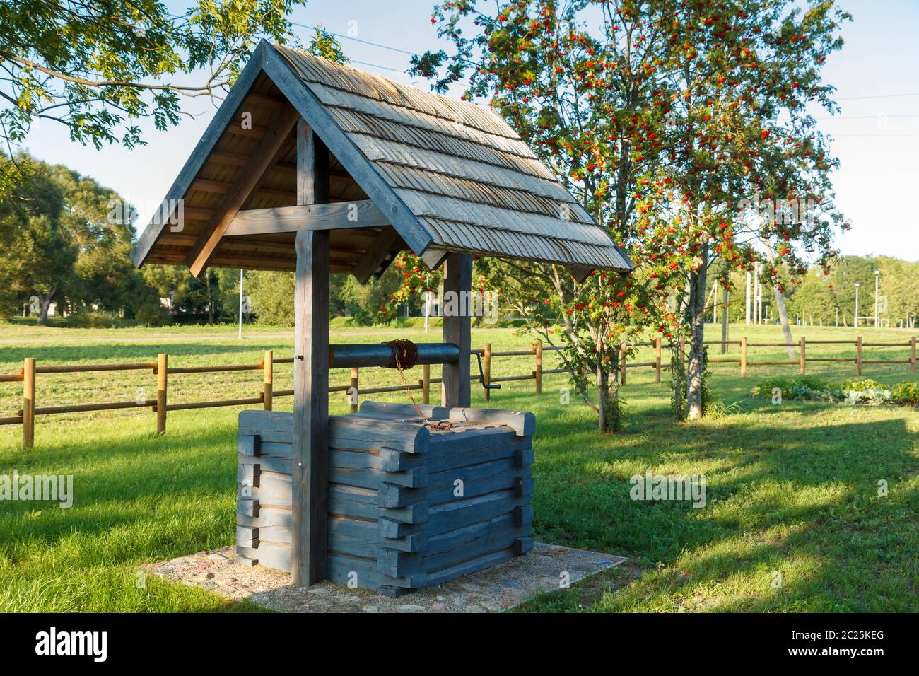 Retro wooden water well in a countryside Stock Photo - Alamy