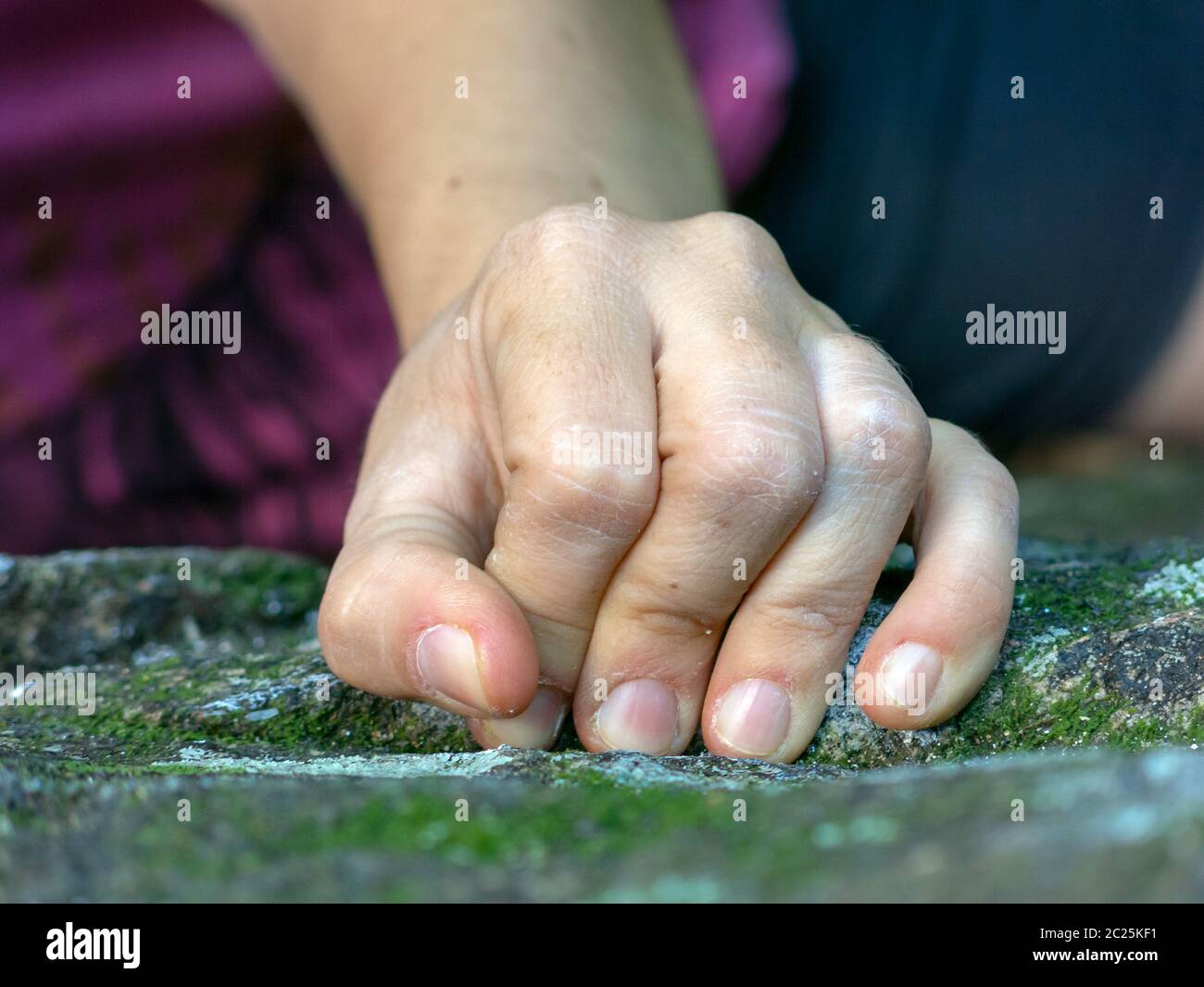 Rock climber hand closeup detail holding climbing Stock Photo - Alamy