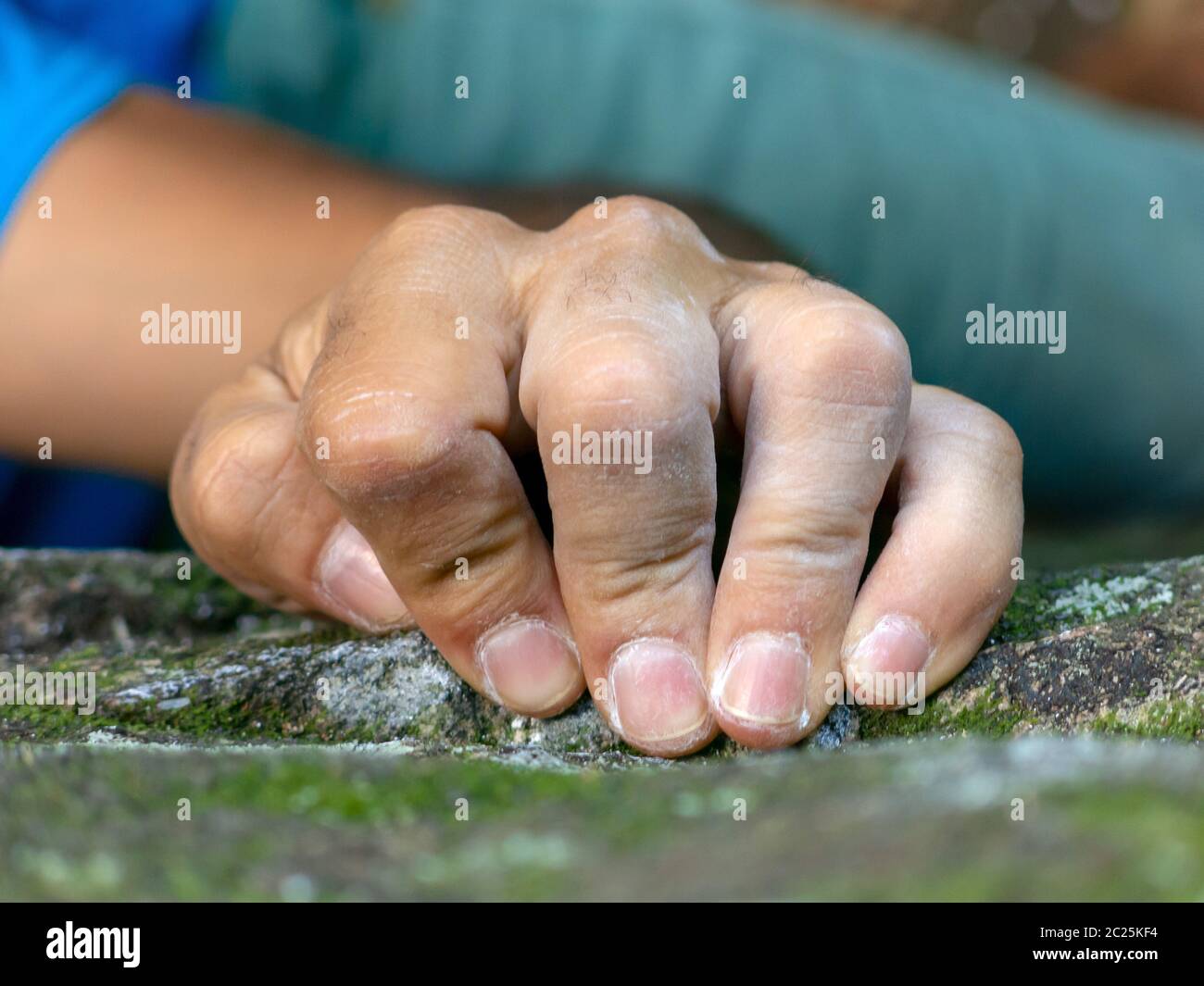 Rock climber hand closeup detail holding climbing Stock Photo - Alamy