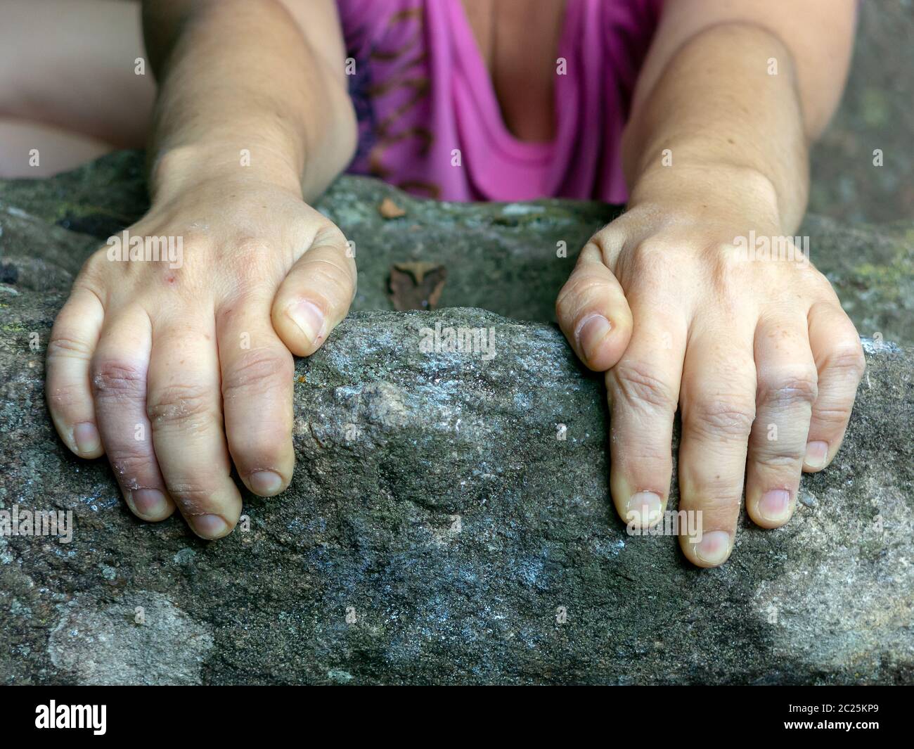 Rock climber hand closeup detail holding climbing Stock Photo - Alamy