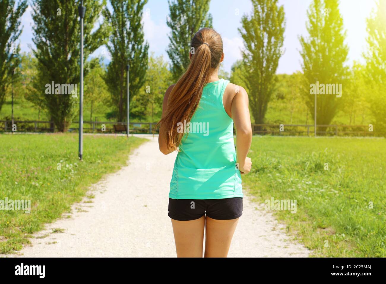 Legs of sportive young woman on path hi-res stock photography and ...
