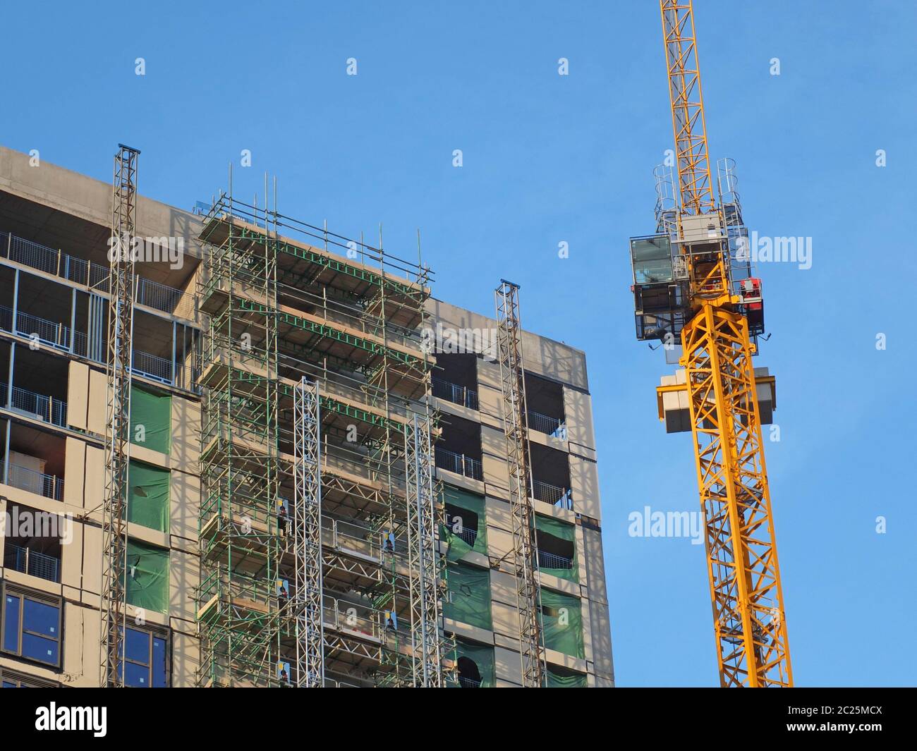 Scaffolding covered building hi-res stock photography and images - Alamy