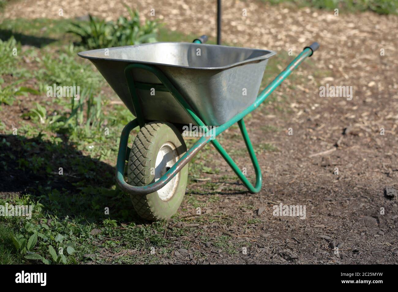Iron trolley for manual moving of building materials in the garden and ...