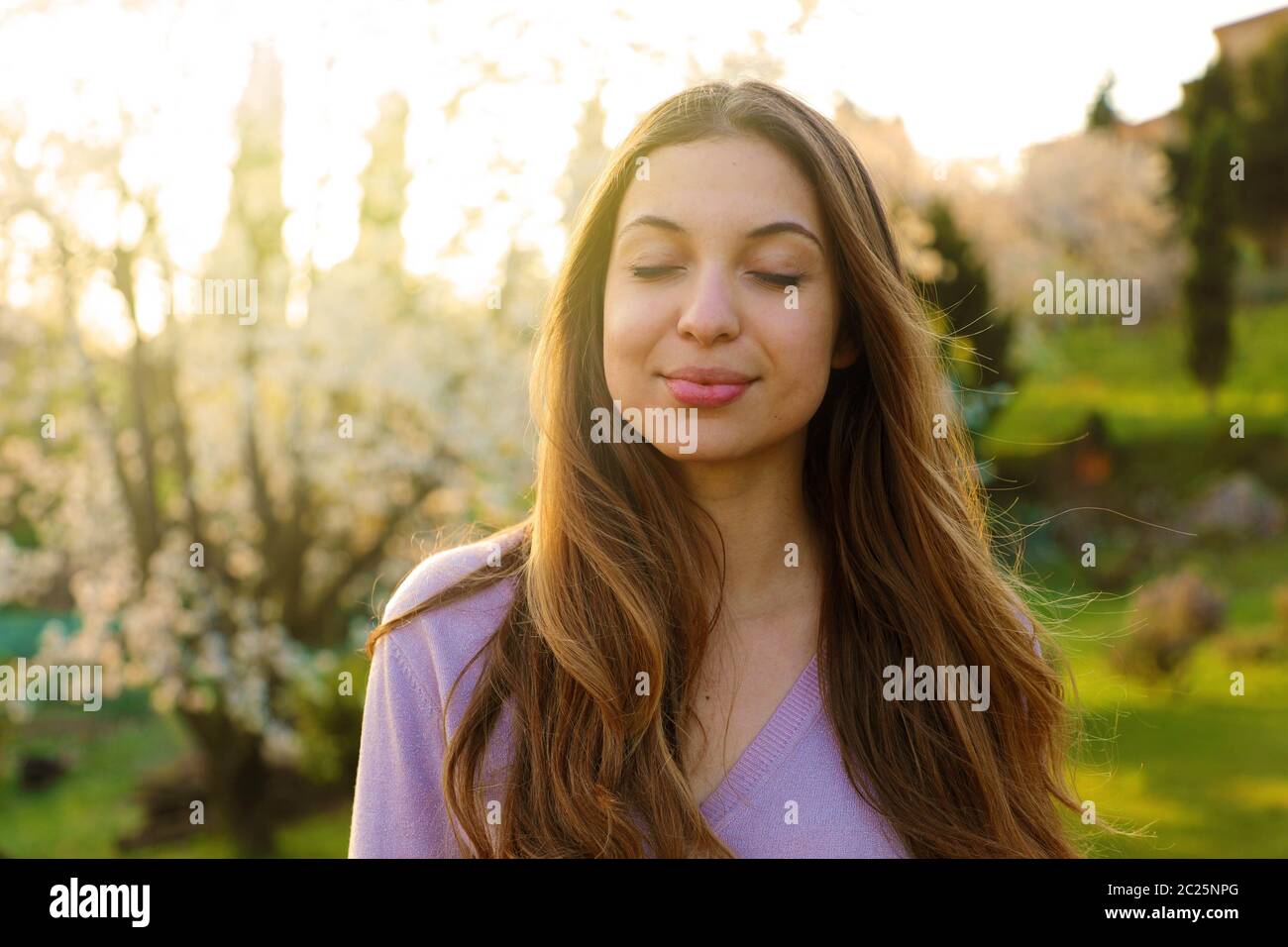 Woman taking deep breath smiling hi-res stock photography and images ...