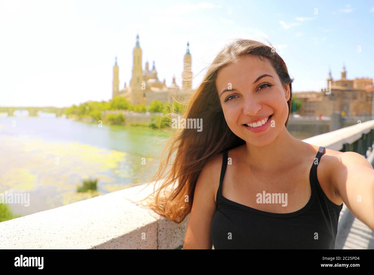 Portrait of happy smiling beautiful girl in Zaragoza, Spain Stock Photo ...