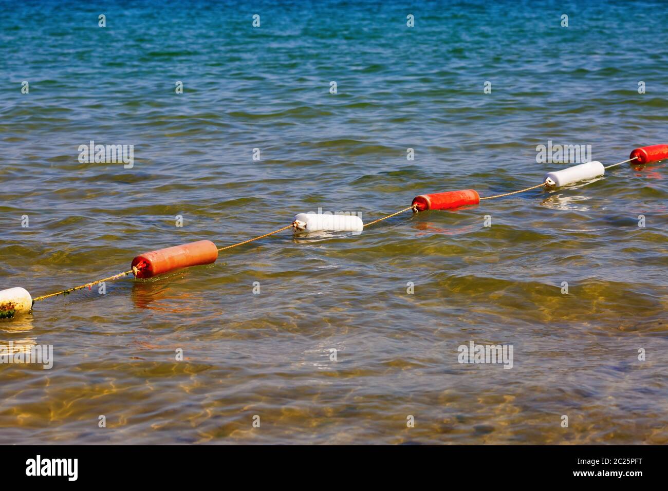 Floating buoys on beach hi-res stock photography and images - Alamy