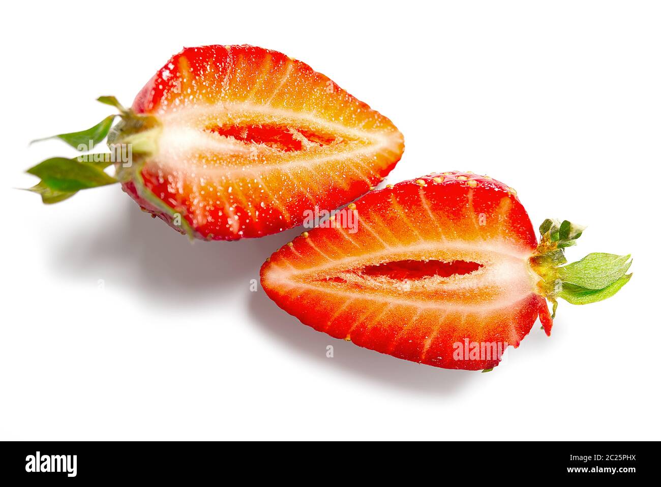 Fresh halved strawberry isolated on white background with clipping path ...