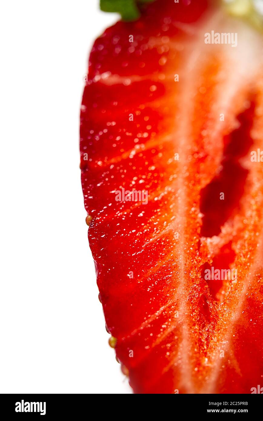 Fresh halved strawberry isolated on white background with clipping path ...