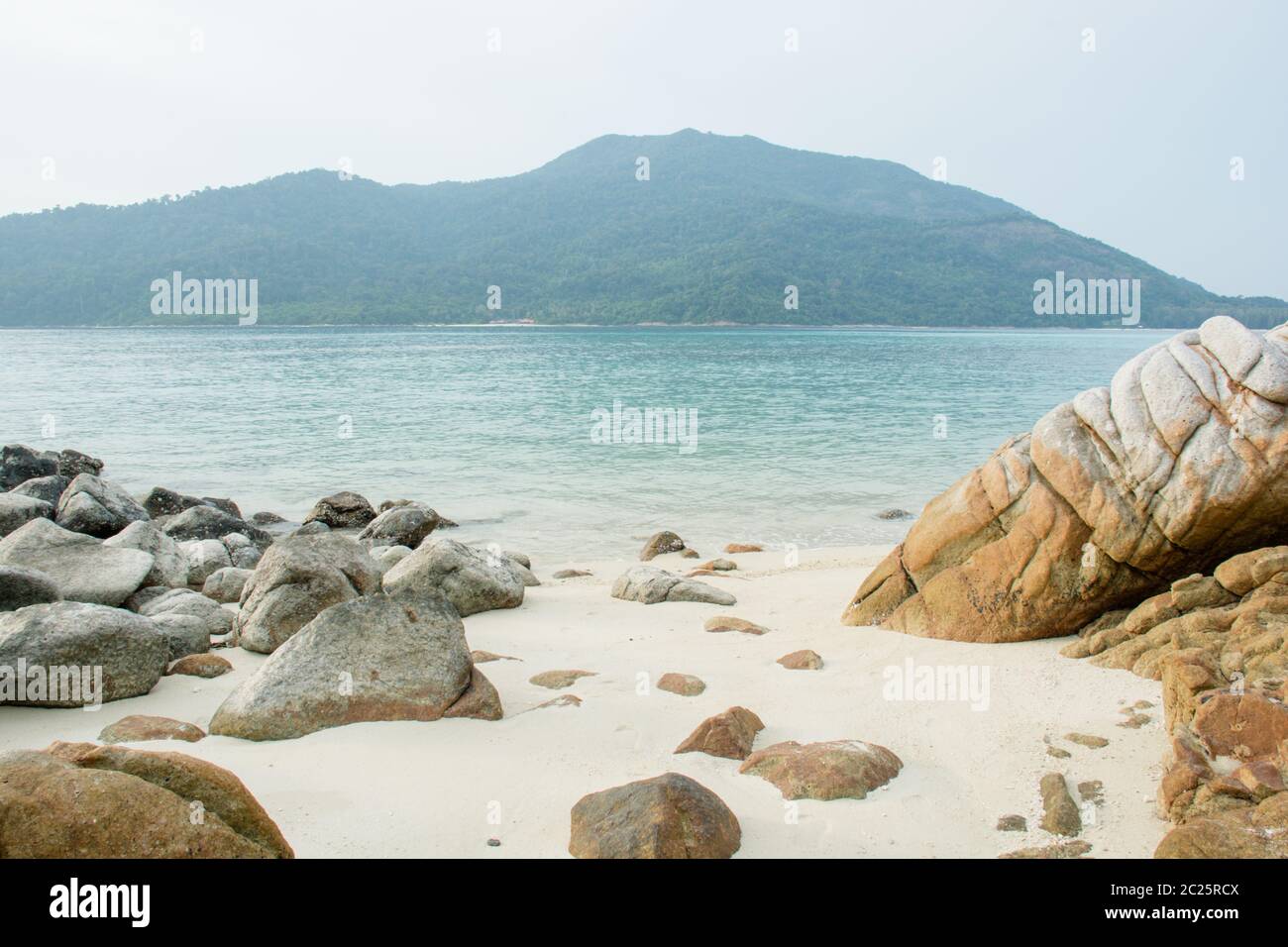 Sea tropical landscape with mountains and rocks Stock Photo - Alamy