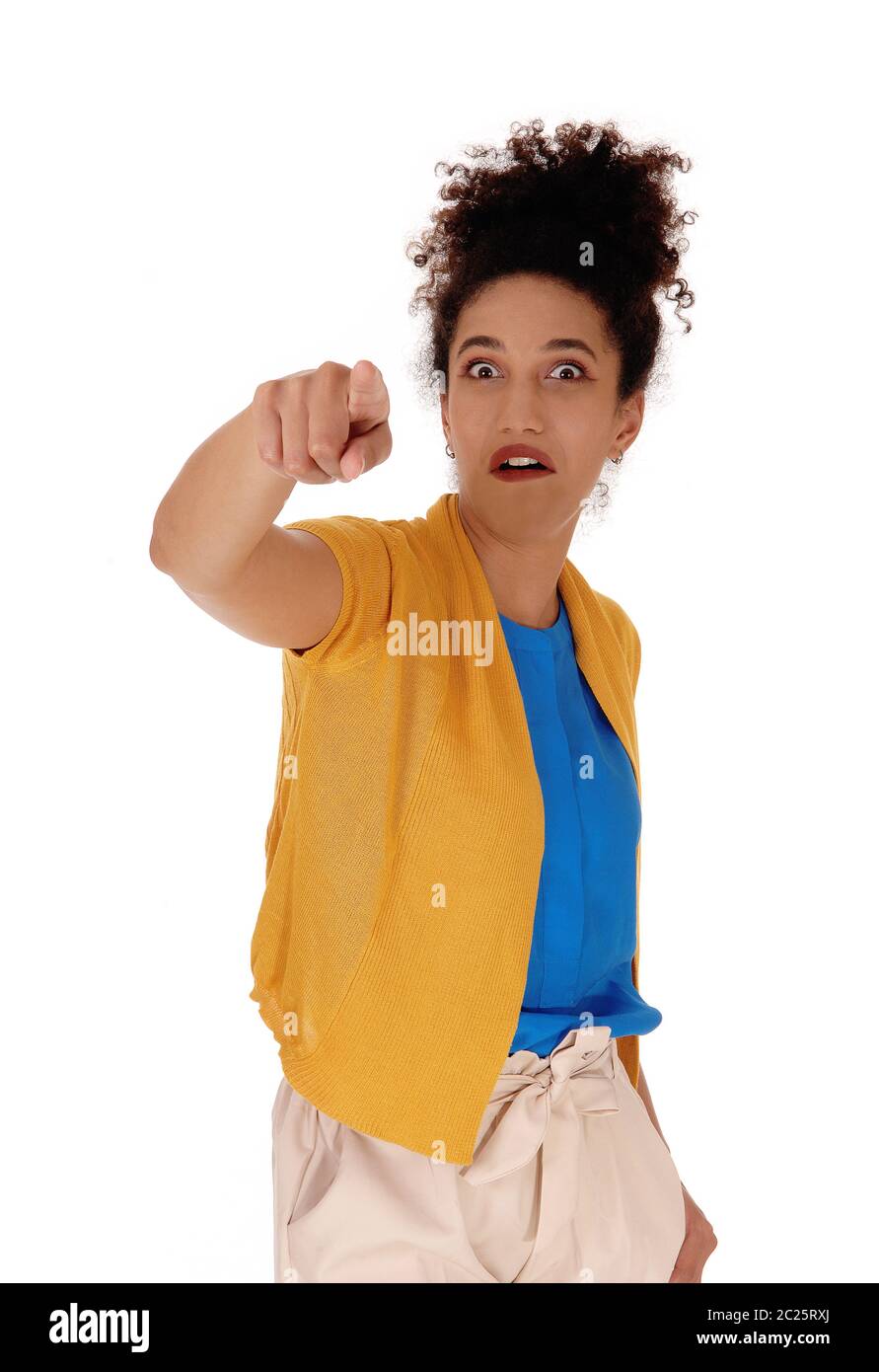 A furious young woman pointing with her finger at you, whit her big ...