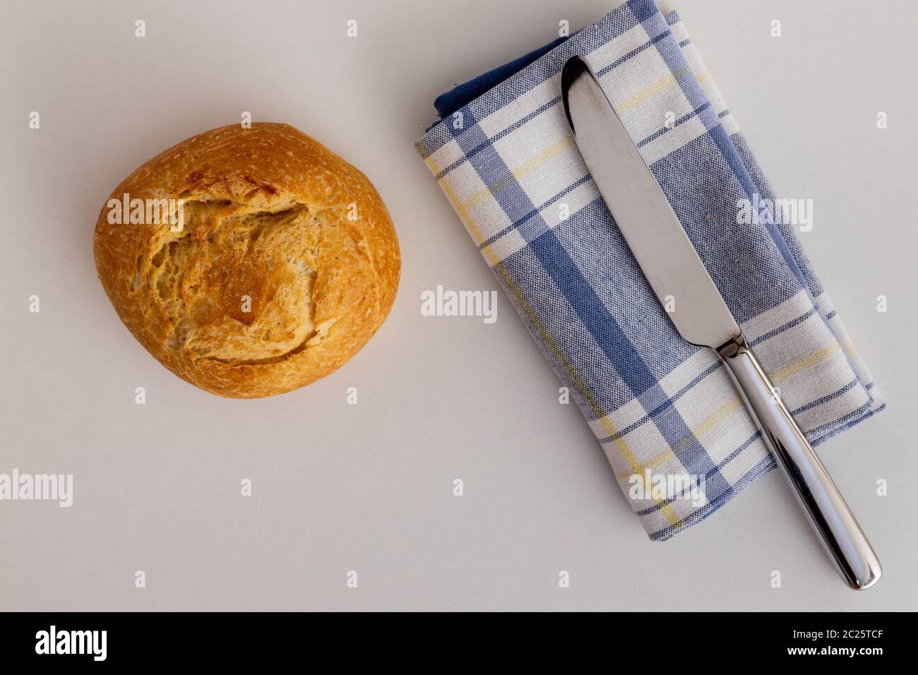 Breakfast with a fresh rustic Bun Stock Photo - Alamy