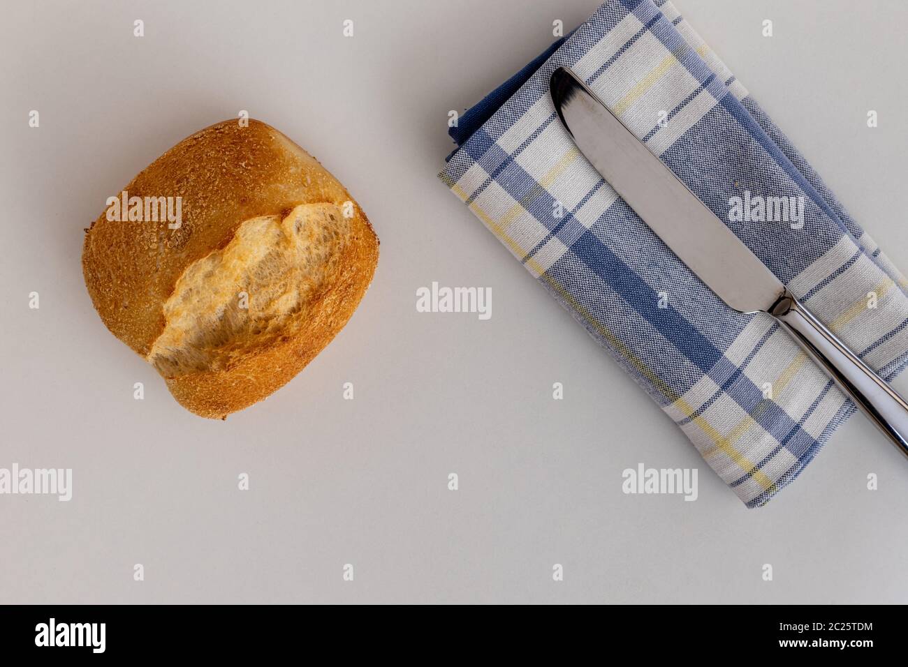 Breakfast with a fresh rustic Bun Stock Photo - Alamy