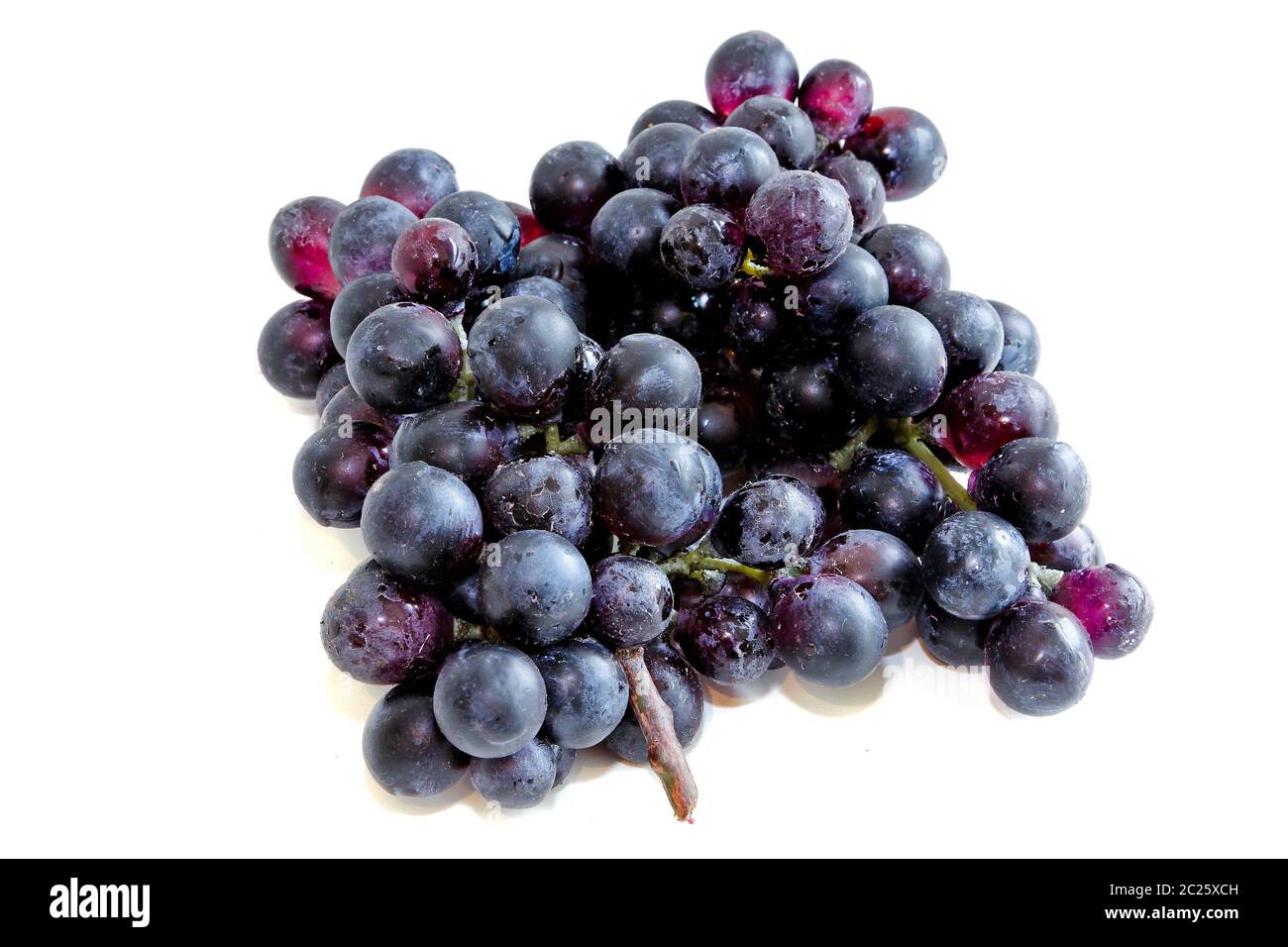 Cluster of Red Grapes on White Background Stock Photo - Alamy