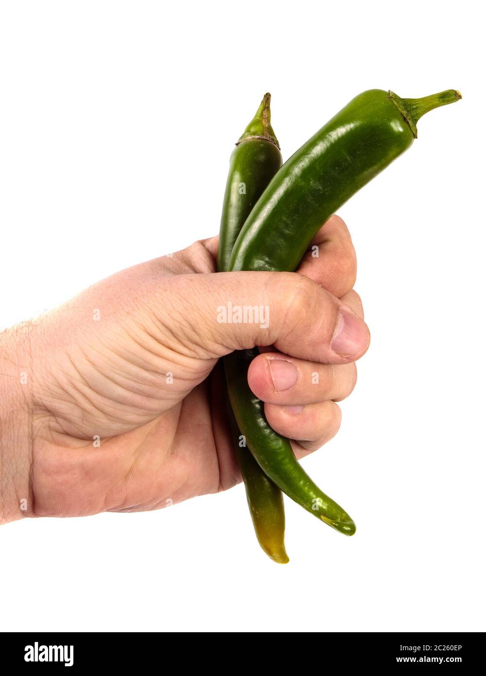 green chilli peppers in male hand. on a white Stock Photo - Alamy