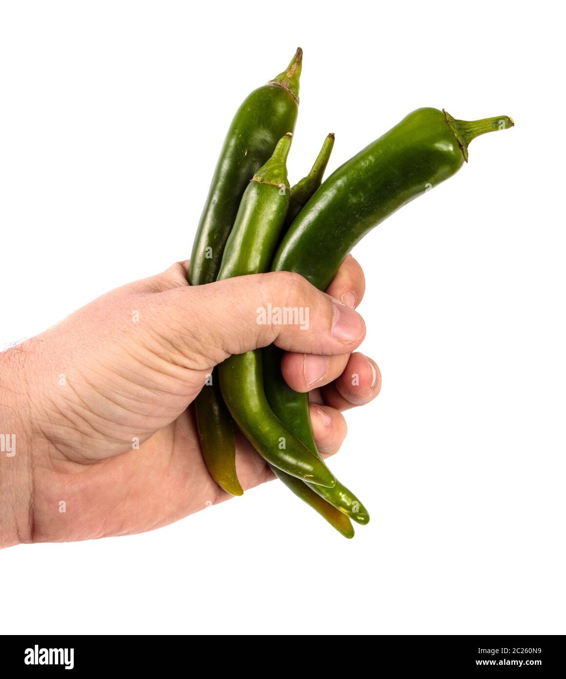 green chilli peppers in male hand. on a white Stock Photo - Alamy