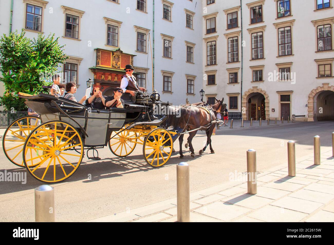Excursion carriage near the Hofburg castle on AUGUST 24, 2017 in Vienna ...