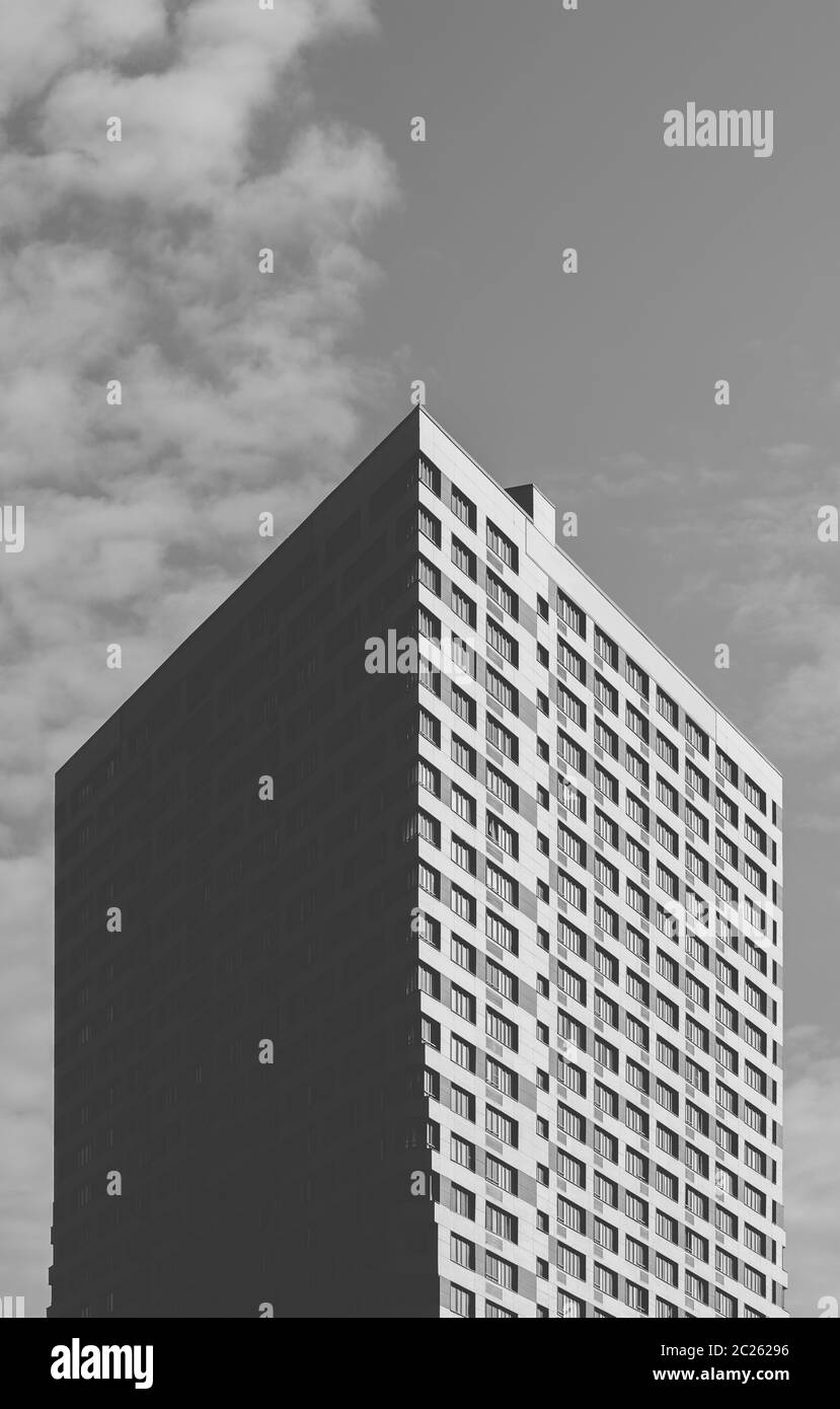 Black and White Skyscraper on the Cloudy Sky Background Stock Photo - Alamy