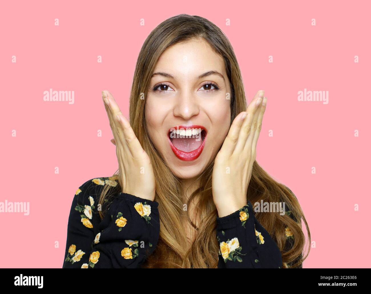 Excited beauty fashion happy model girl over pink background. Laughing ...