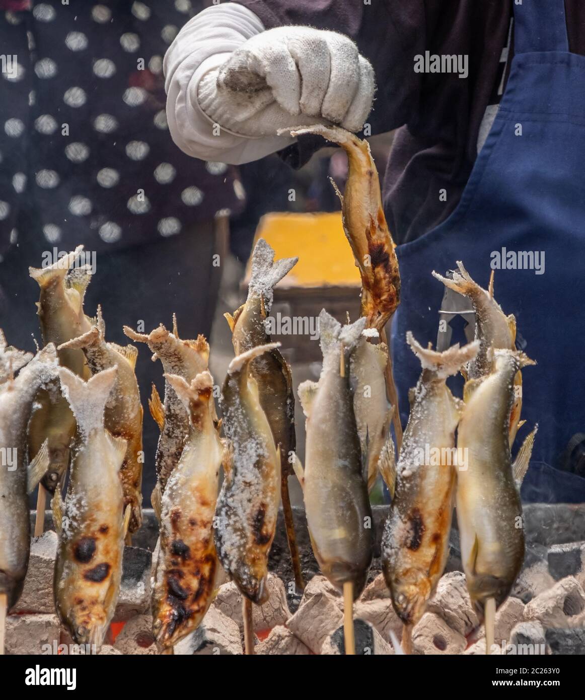 Grilled fish by food vendor, Tokyo, Japan Stock Photo - Alamy