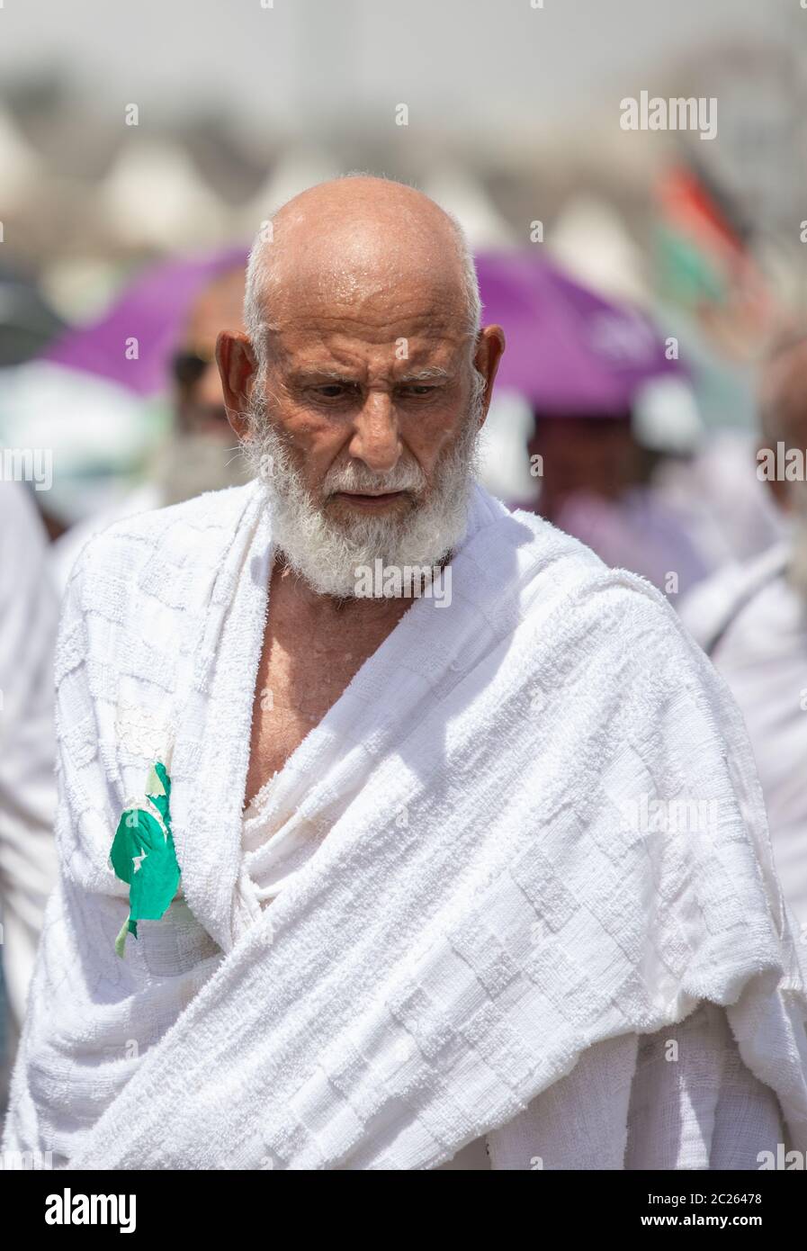 old man in Hajj season Pilgrims in day time, Performing Hajj, Mina ...