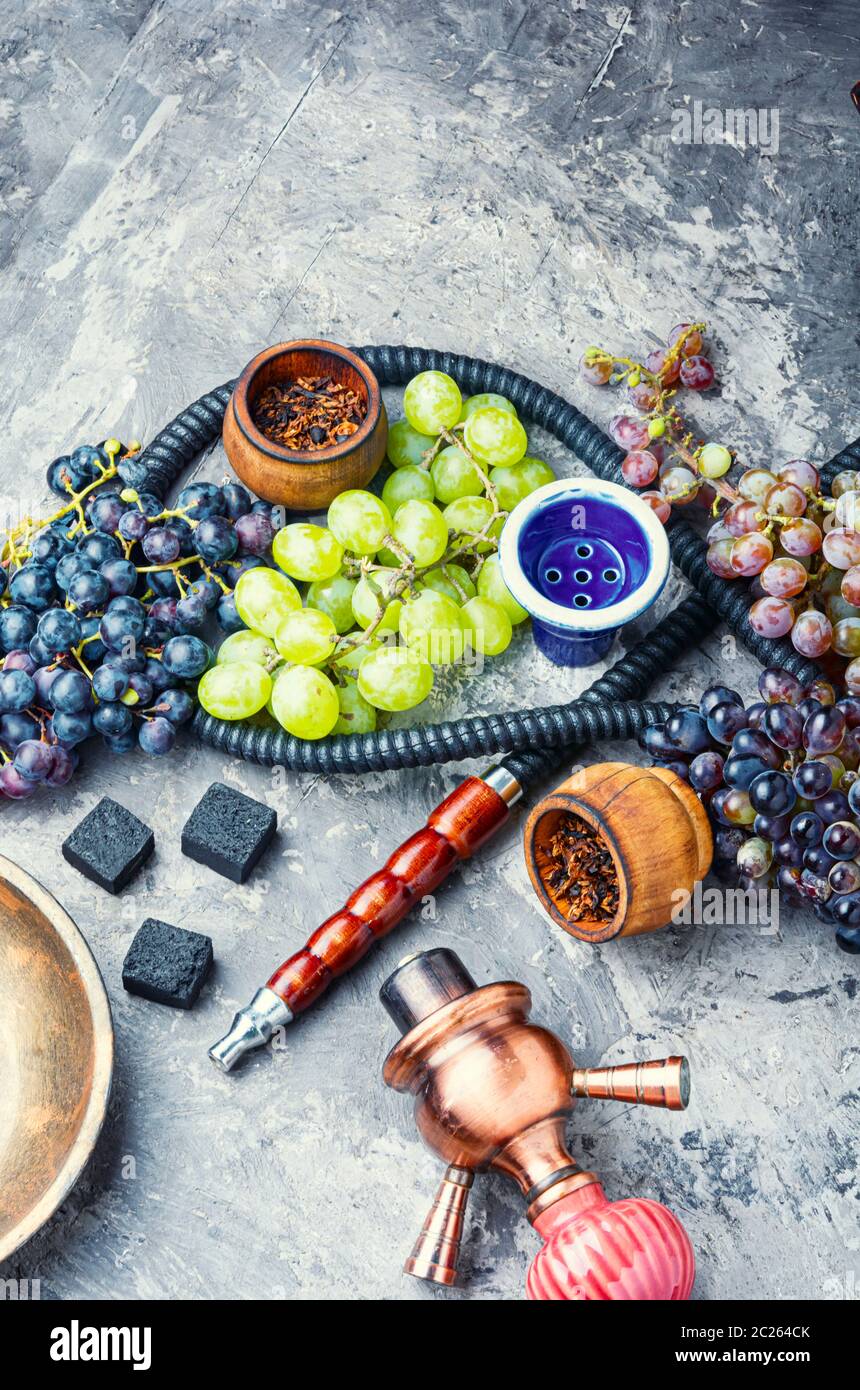 Tobacco shisha with grapes flavor.Nargile with grapes.Turkish fruit hookah tobacco Stock Photo ...