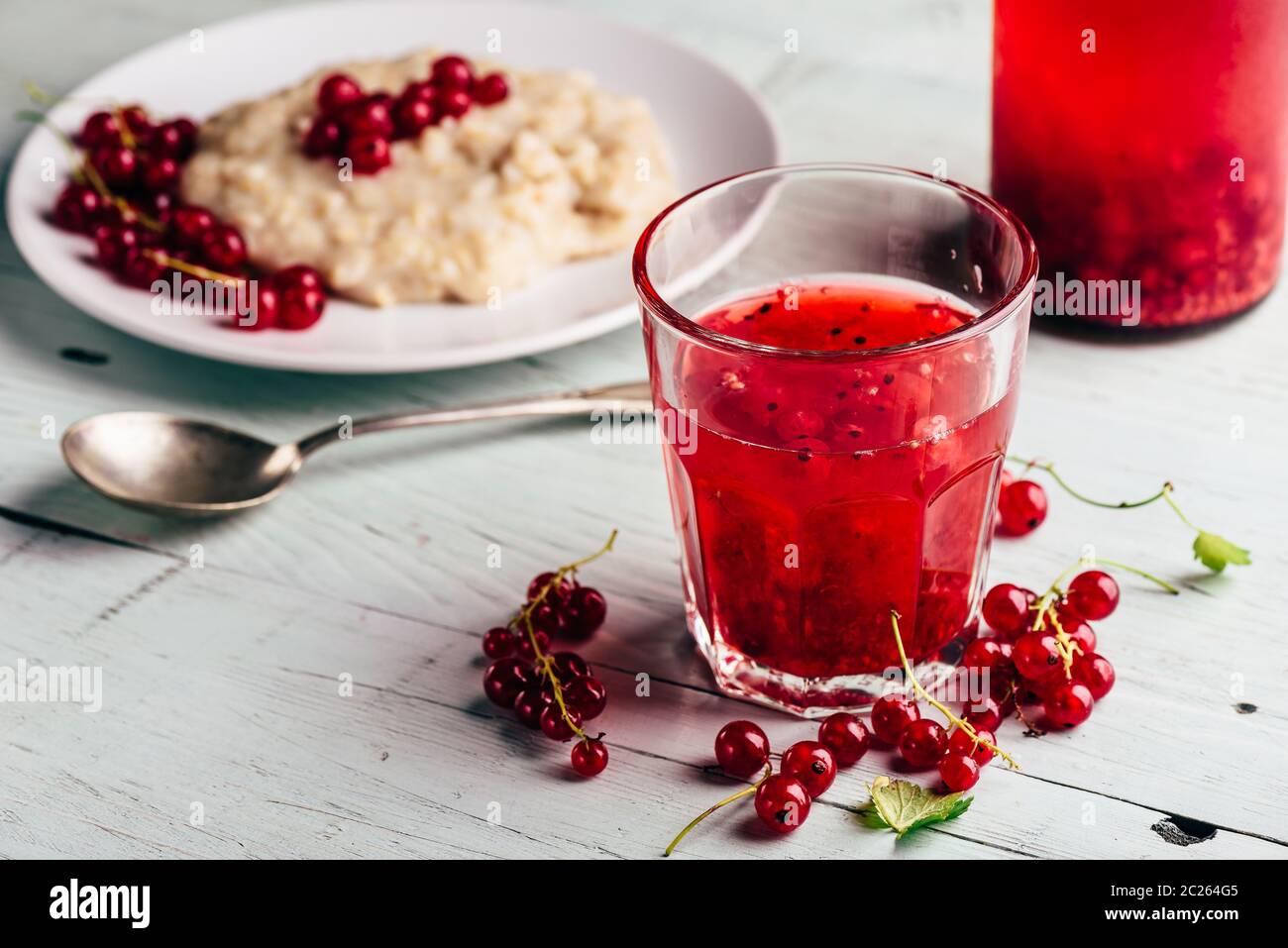 Simple and healthy breakfast with porridge and infused water with ...