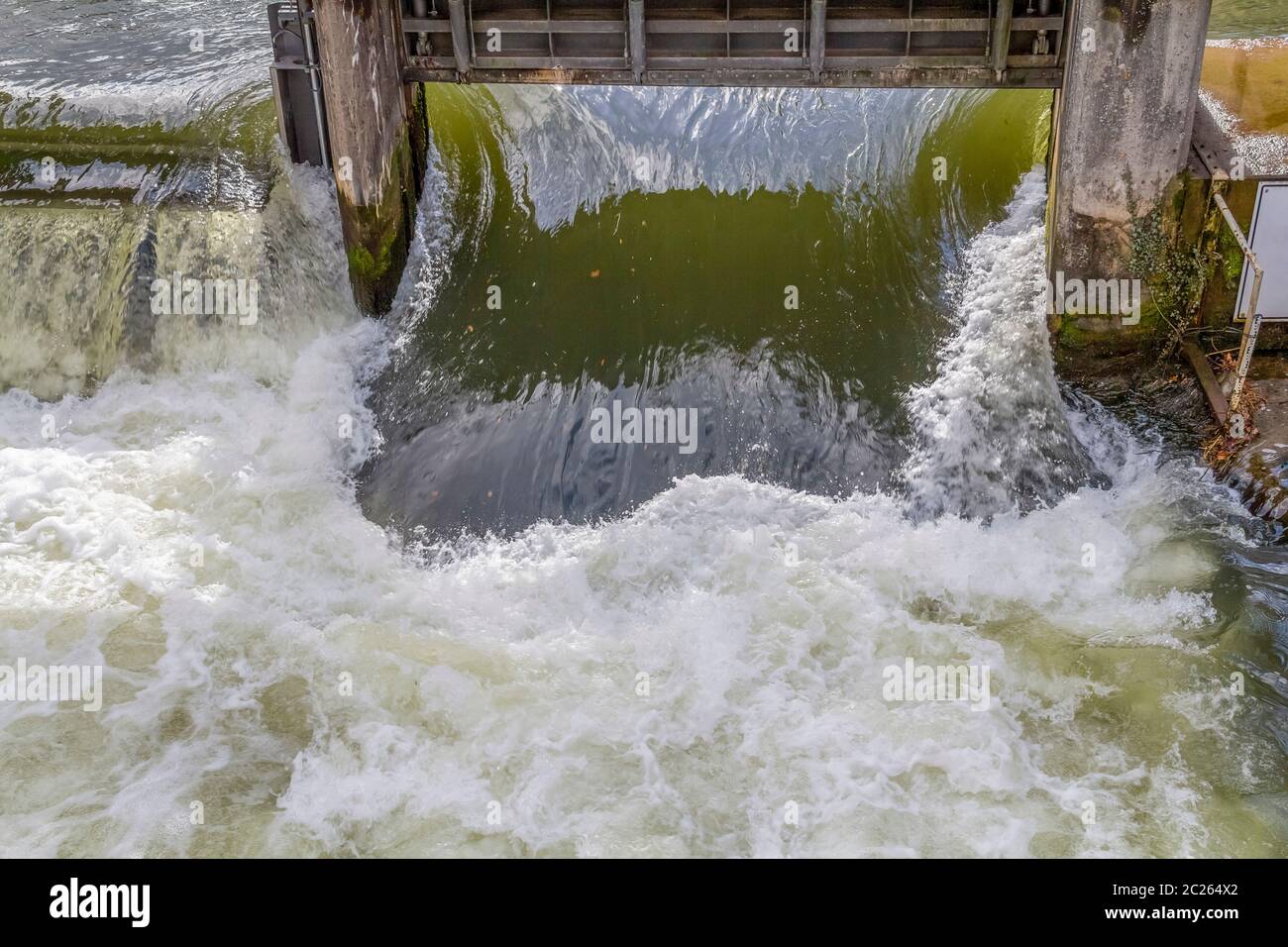 historic weir with flowing water Stock Photo - Alamy