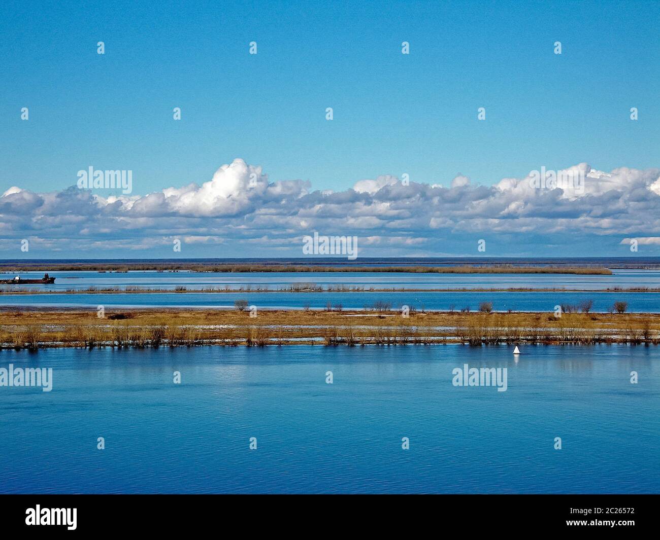 River landscape Early spring. bare trees, melting snow Stock Photo - Alamy